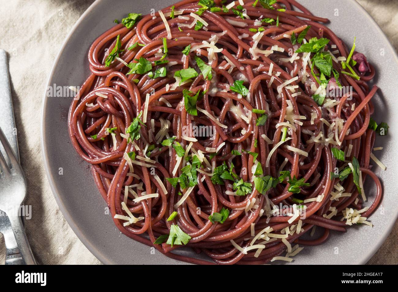 Homemade Red Wine Spaghetti with Cheese and Parsley Stock Photo - Alamy