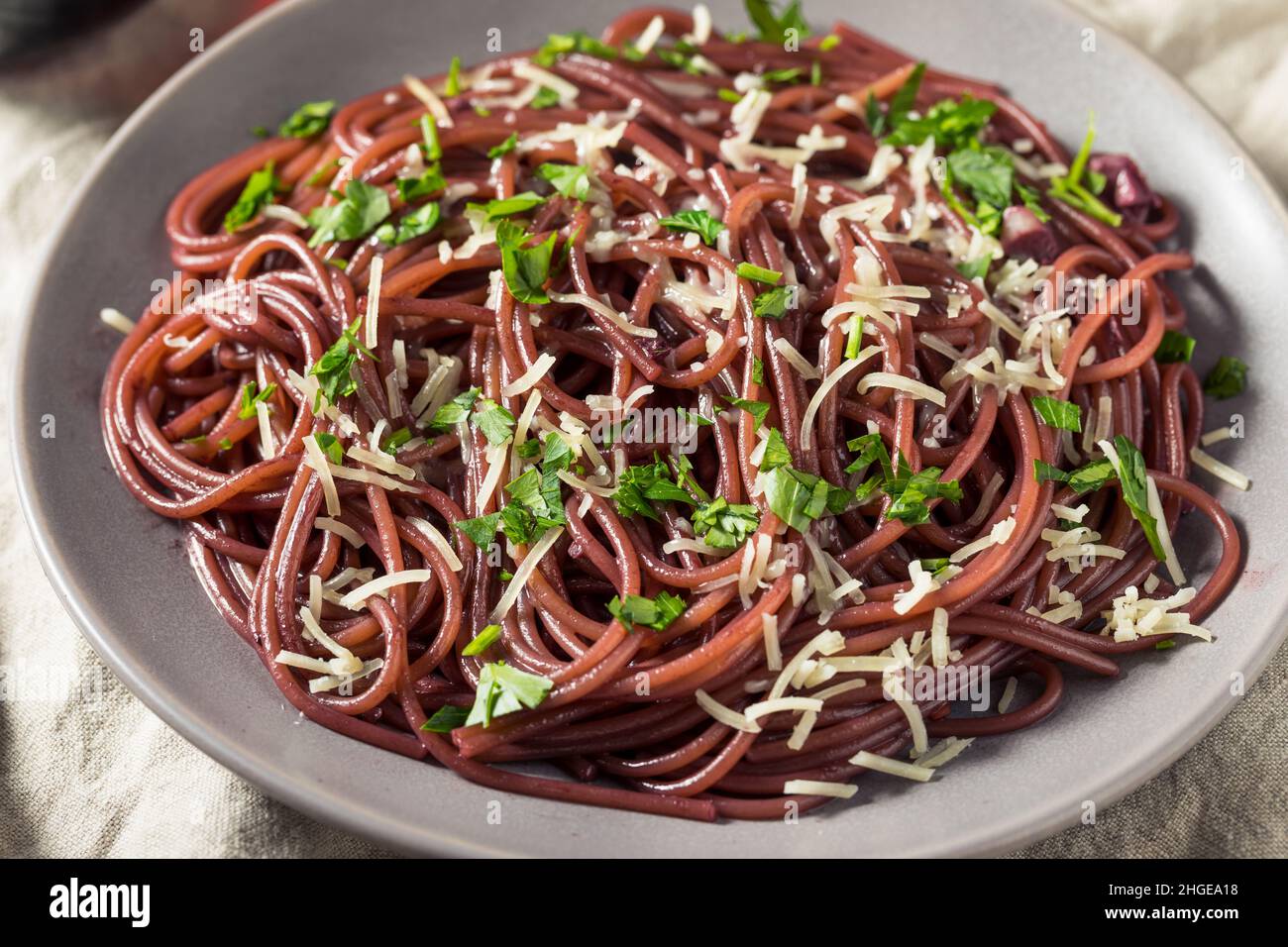 Homemade Red Wine Spaghetti with Cheese and Parsley Stock Photo - Alamy