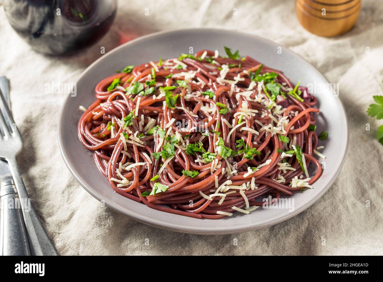 Homemade Red Wine Spaghetti with Cheese and Parsley Stock Photo - Alamy