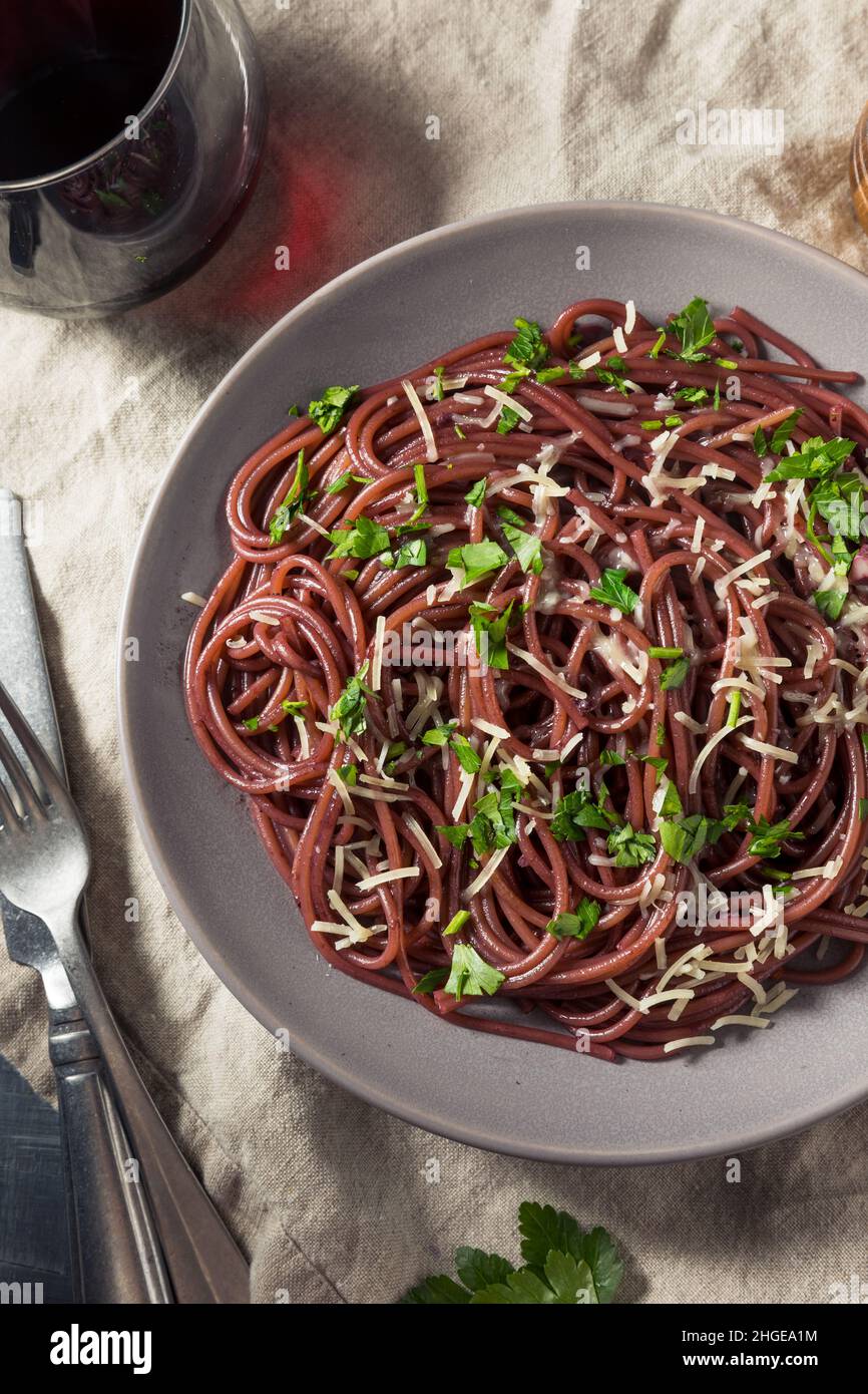 Homemade Red Wine Spaghetti with Cheese and Parsley Stock Photo - Alamy