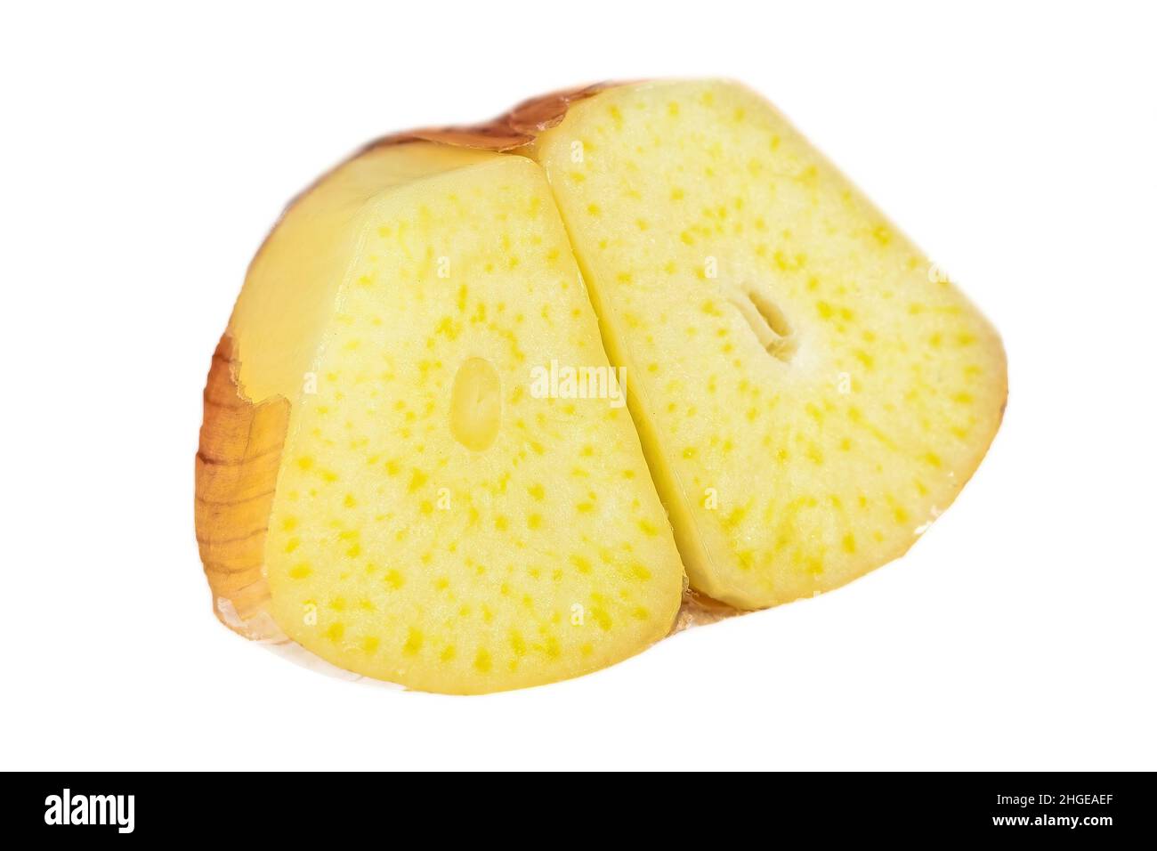 Cross section of two garlic cloves in white background Stock Photo - Alamy