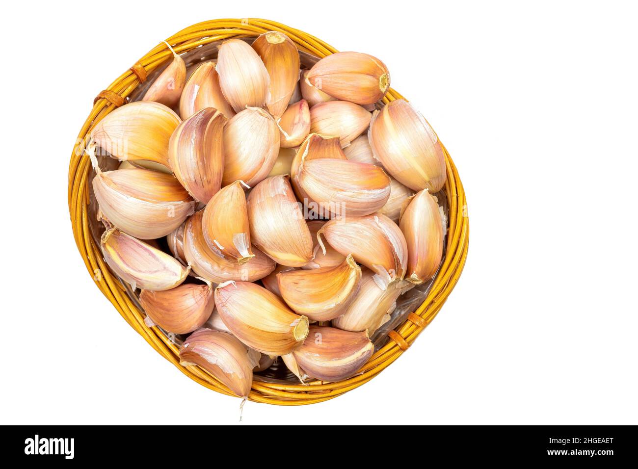 Top-down view of whole garlic cloves over white background Stock Photo ...