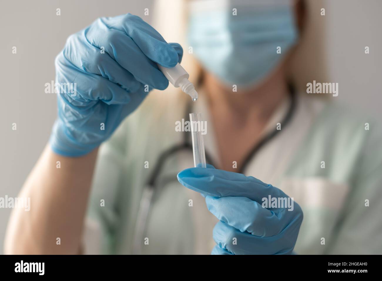 testing by a nurse for an elderly woman Stock Photo - Alamy