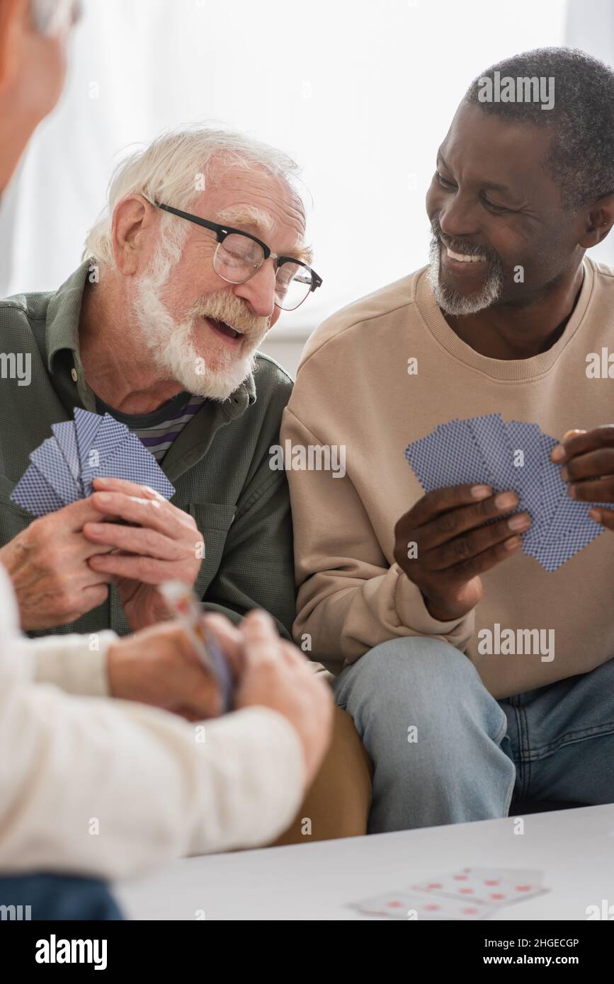African men playing cards hi-res stock photography and images - Alamy