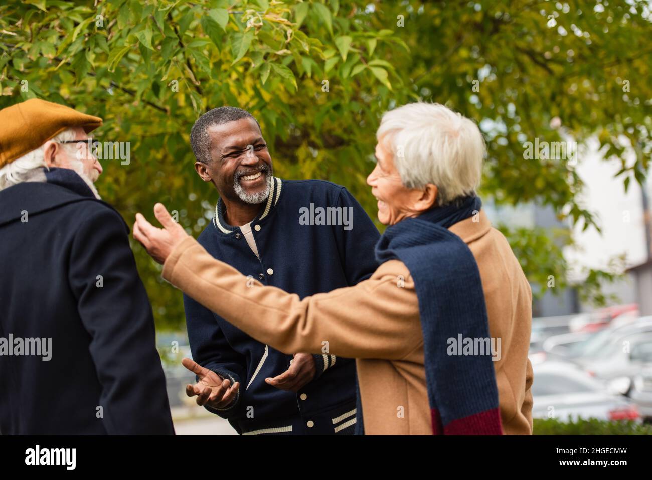 Elderly people talking street hi-res stock photography and images - Alamy