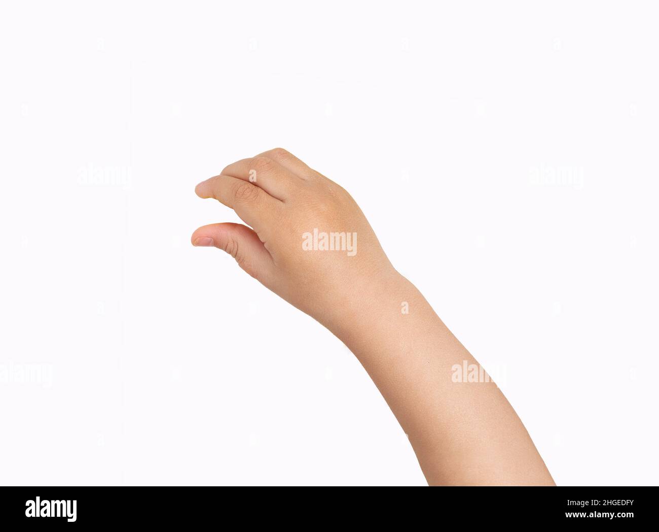 Studio shot of a boy hand hanging something blank isolated on a white ...
