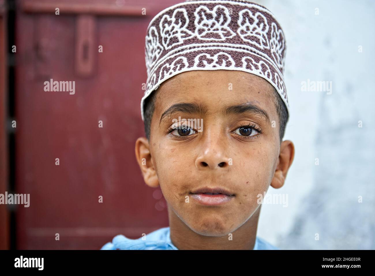 Oman. Muscat. Portrait of omani boys Stock Photo - Alamy
