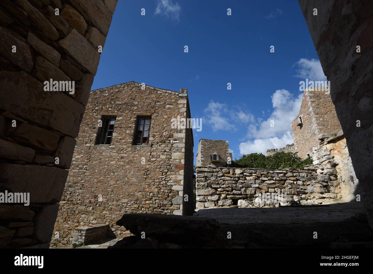 Landscape with scenic view of a stone built tower-mansion in the ...