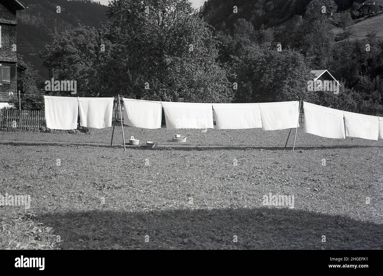 1950s, historical, washing line with clothes hanging up, Pryenees ...