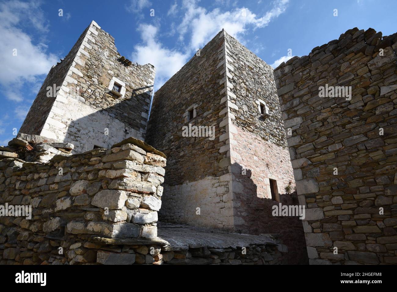 Landscape with scenic view of a stone built tower-mansion in the ...