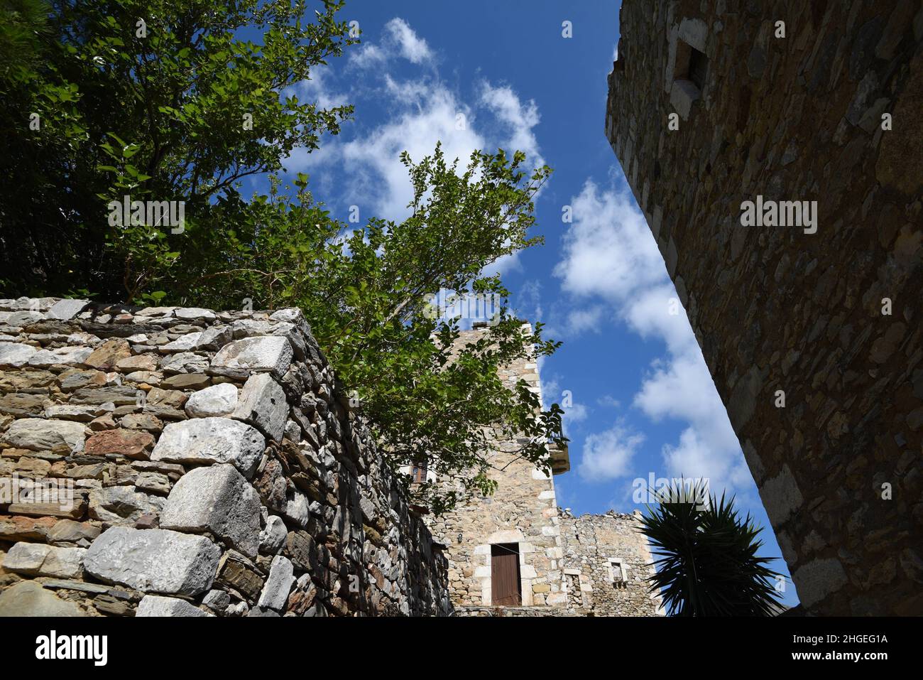 Landscape with scenic view of a stone built tower-mansion in the ...