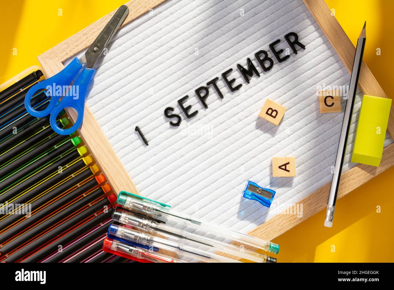 1 september letter board with school supplies as pens, scissors, ABC ...