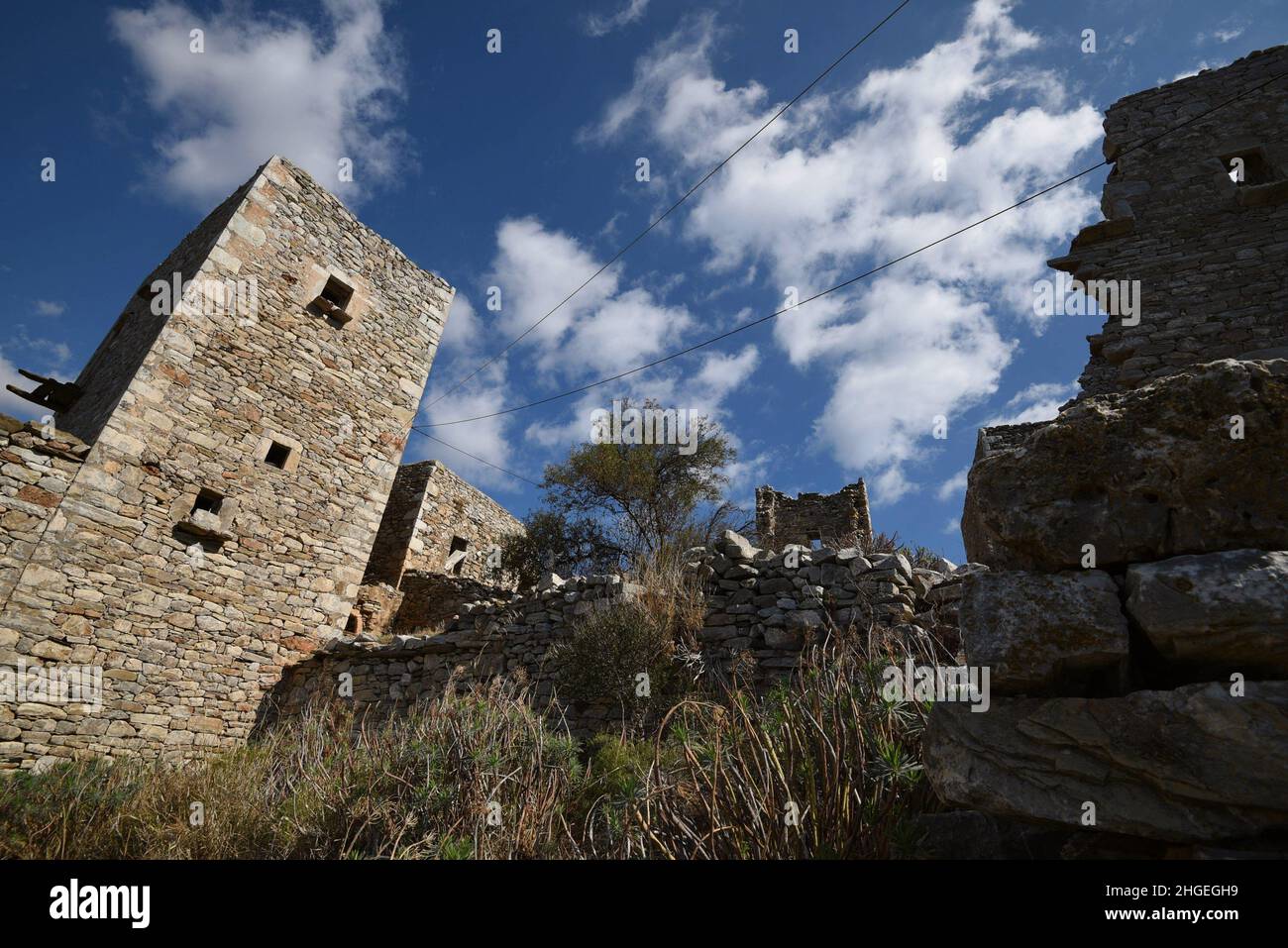 Landscape with scenic view of a stone built tower-mansion in the ...