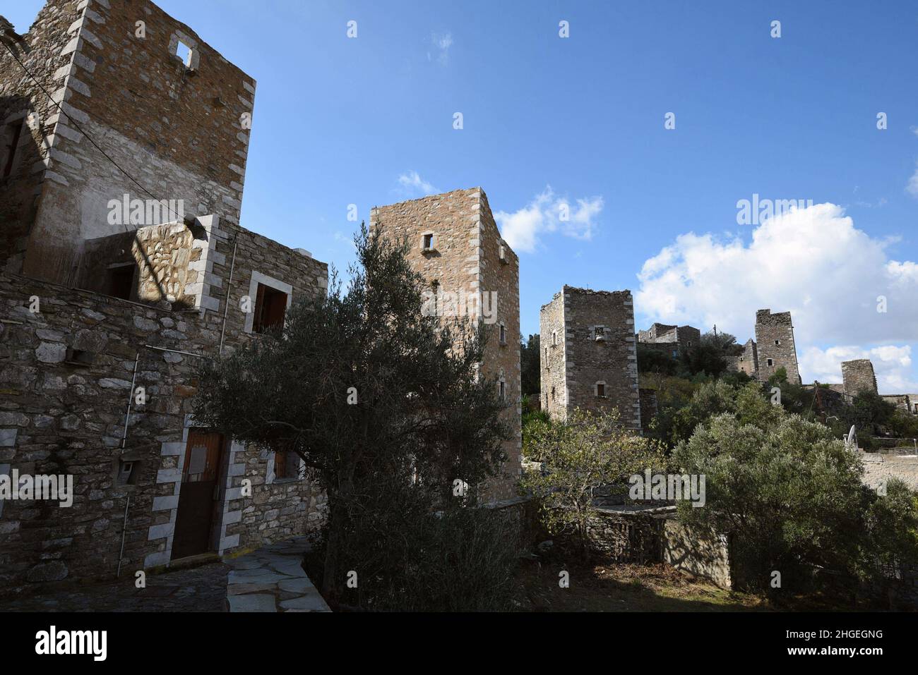 Landscape with scenic view of a stone built tower-mansion in the ...