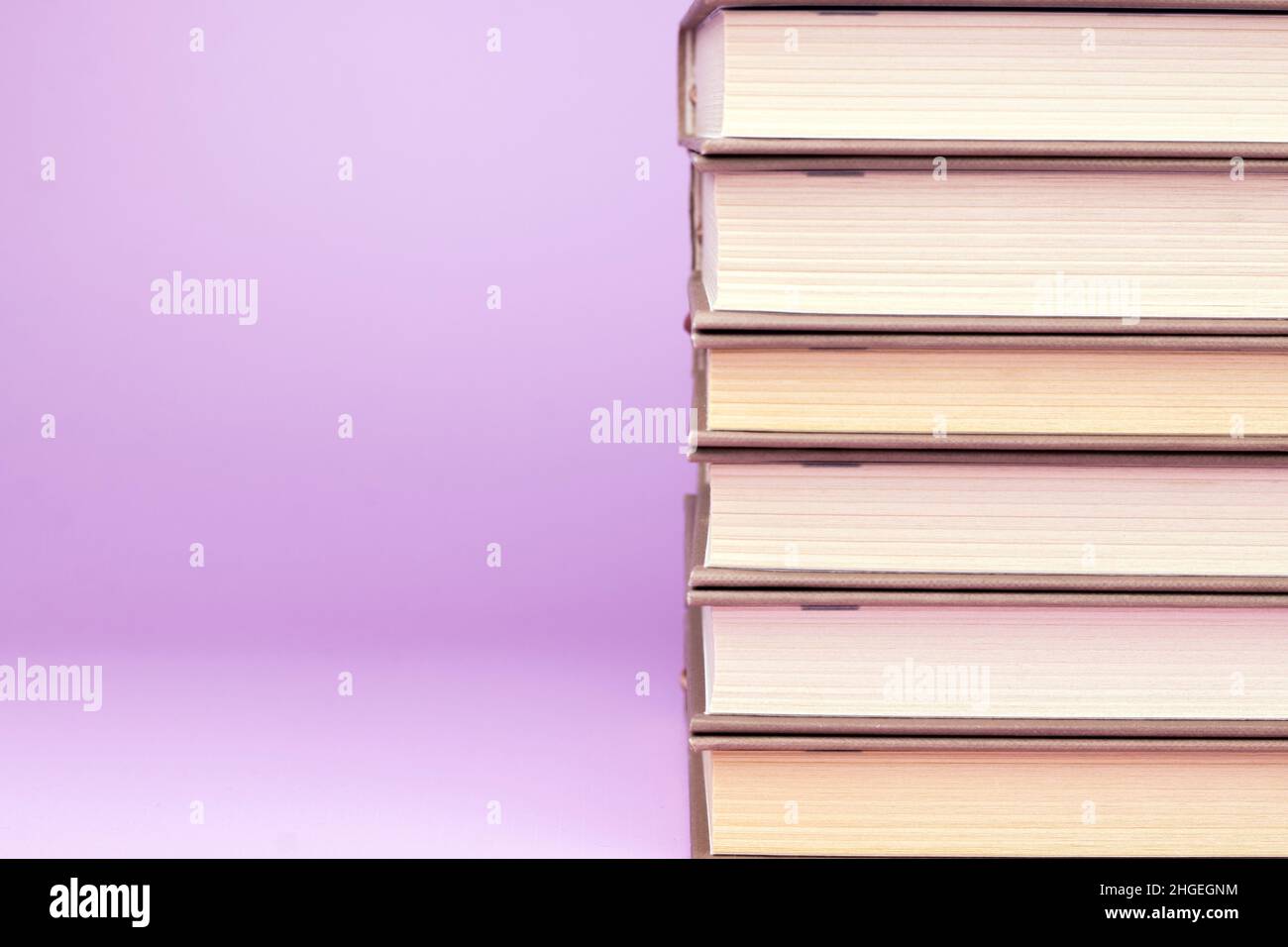 Stack of books on pink background. Study, education and back to school ...