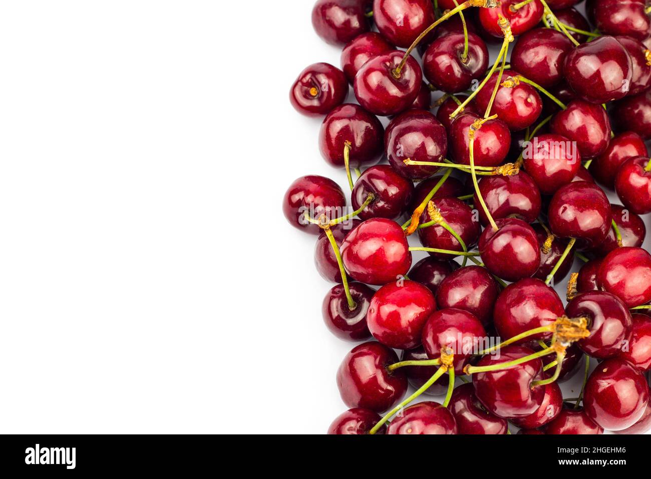 Fresh cherry with stems isolated on white background Stock Photo - Alamy