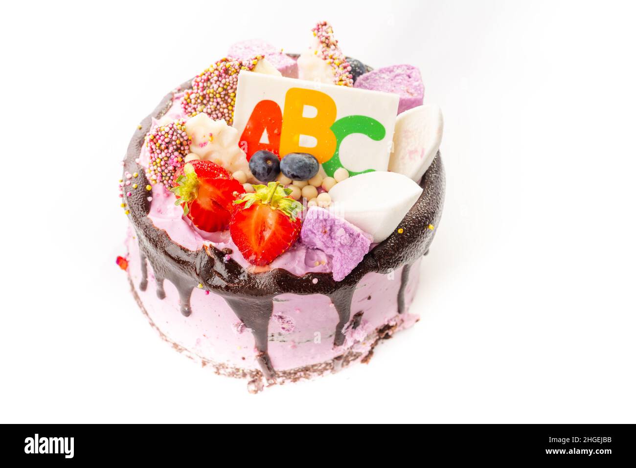 Banner of Beginning of the school year concept, festive cake with ABC ...