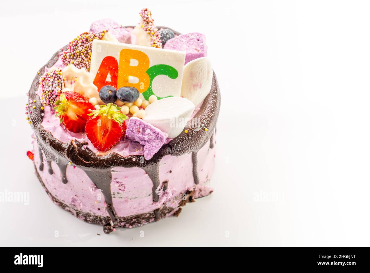 Banner of Beginning of the school year concept, festive cake with ABC ...