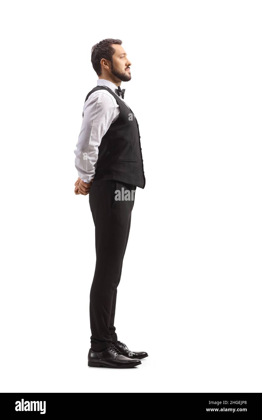 Full length profile shot of an elegant waiter standing isolated on ...