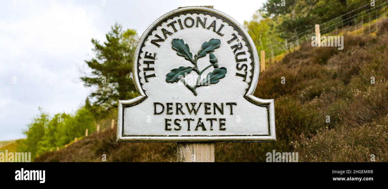 A National Trust sign for the Derwent Estate, Peak District Stock Photo ...