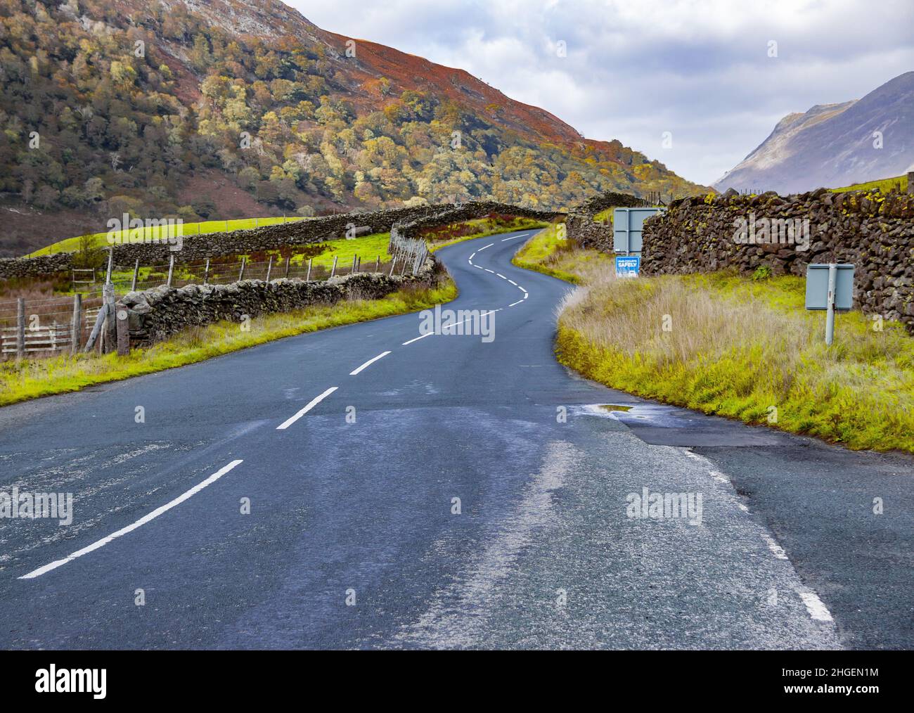 The A592 road cutting through the scenic Lake District Stock Photo - Alamy