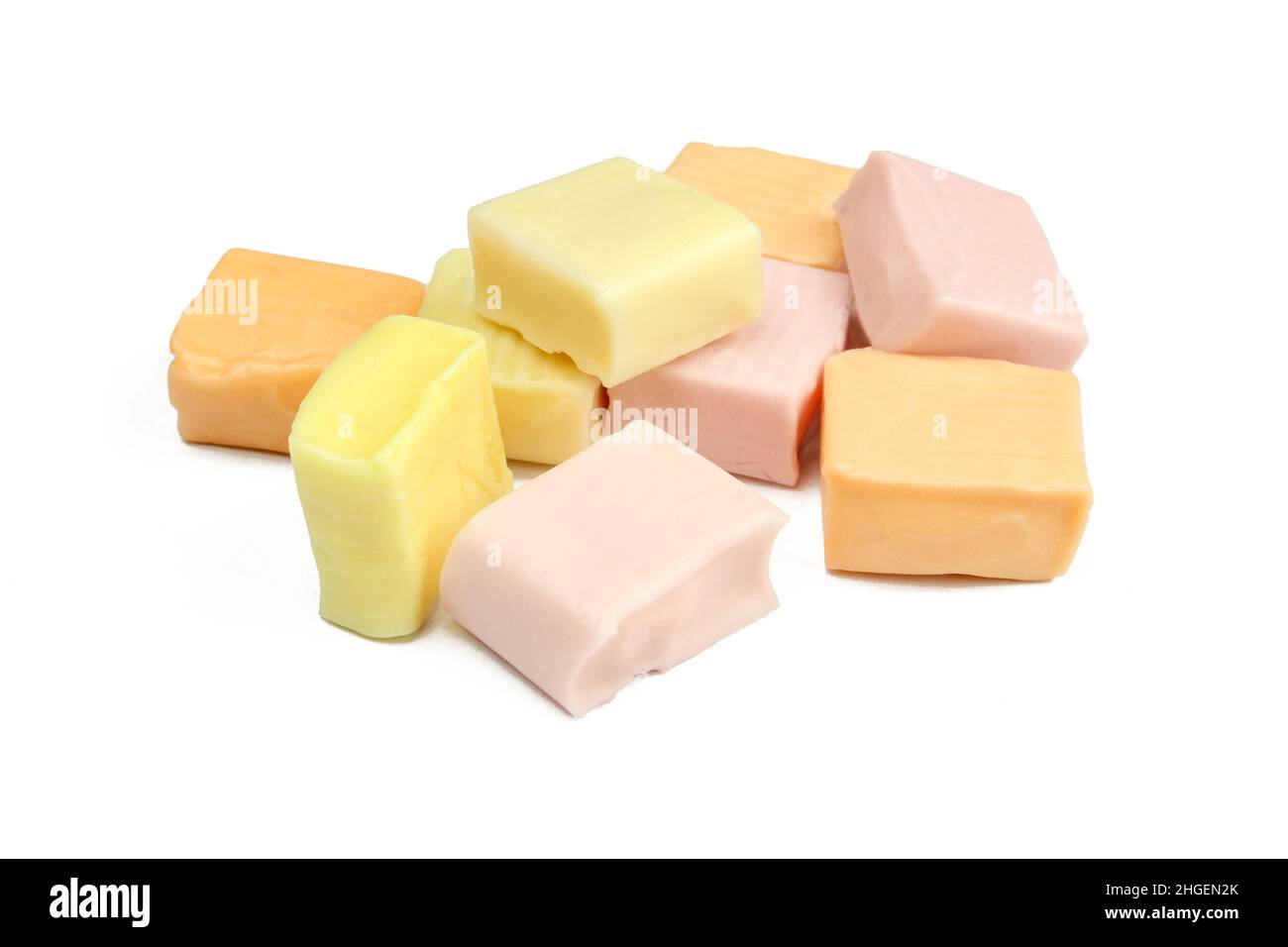 Colorful chewy candies isolated on white background. Square shaped ...