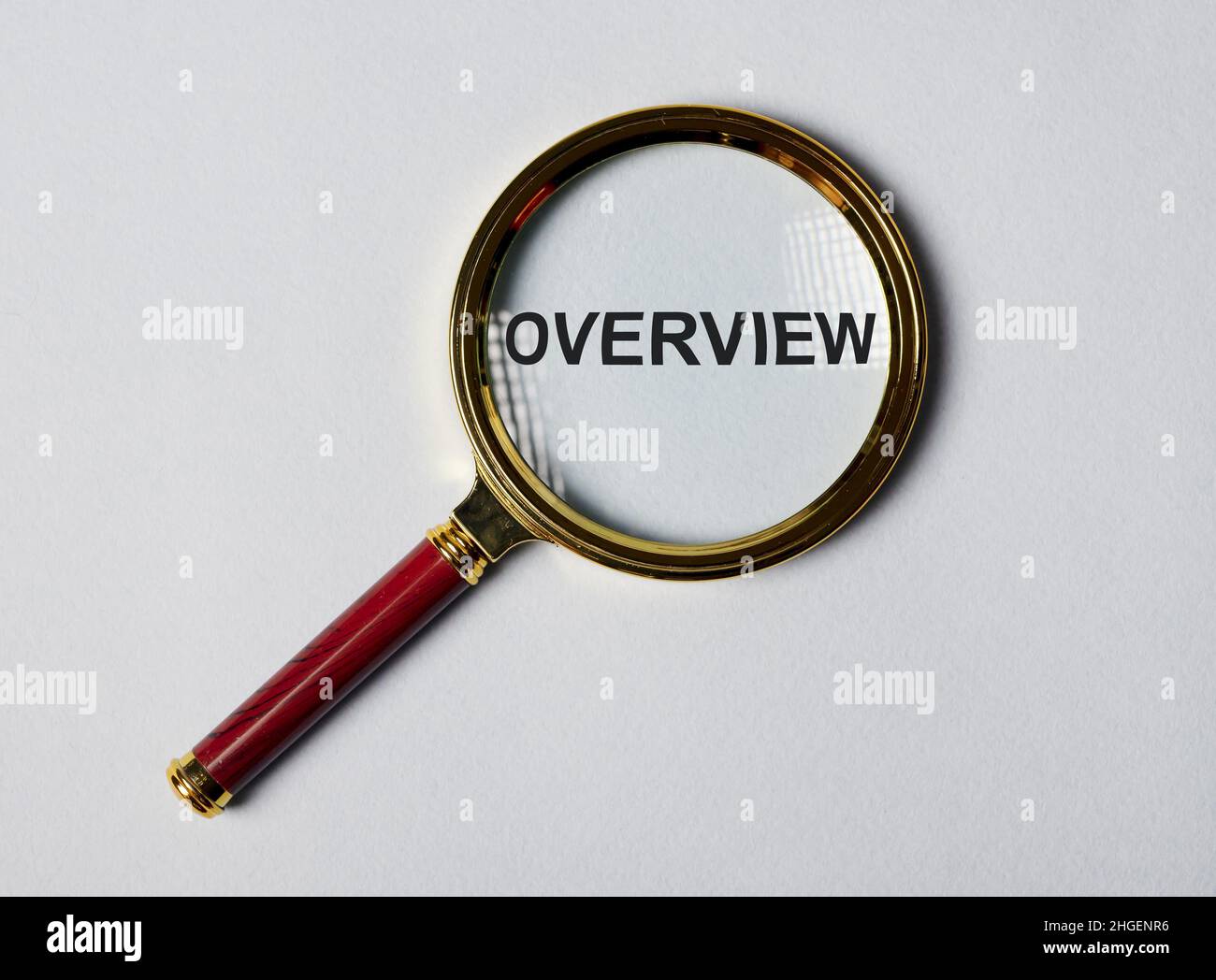 Overview word through magnifying lens. Recap and summary concept Stock ...
