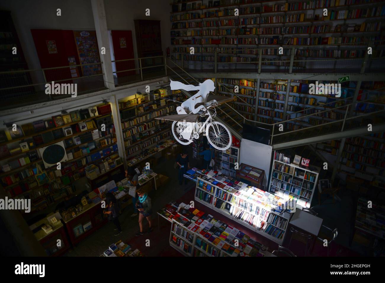 Flying bicycle inside “Ler Devagar” (“Read Slowly”) bookstore, named ...