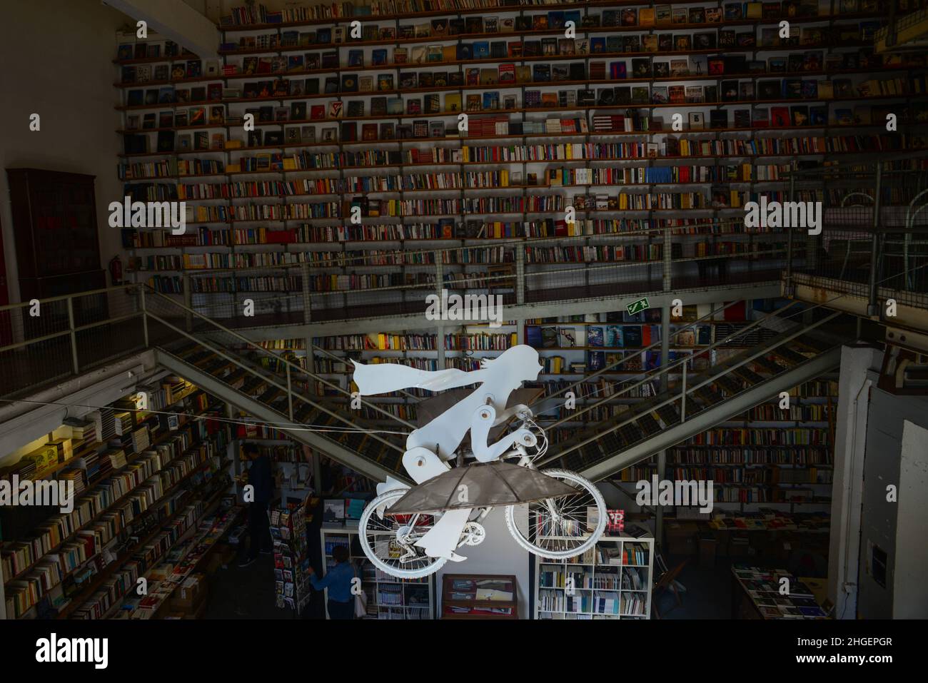 Flying bicycle inside “Ler Devagar” (“Read Slowly”) bookstore, named ...