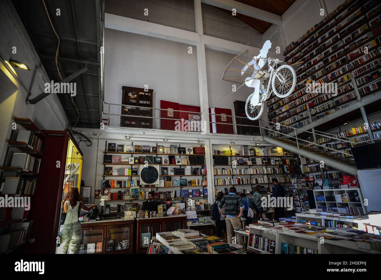 Flying bicycle inside “Ler Devagar” (“Read Slowly”) bookstore, named ...
