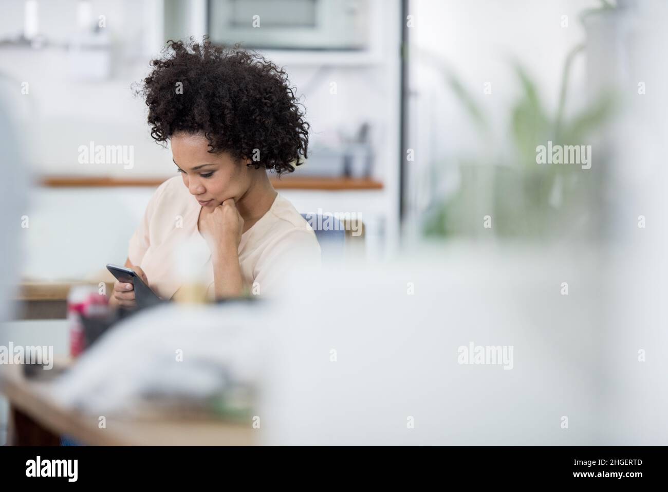 Texting at work. Real life businesspeople shot on location. Since these ...