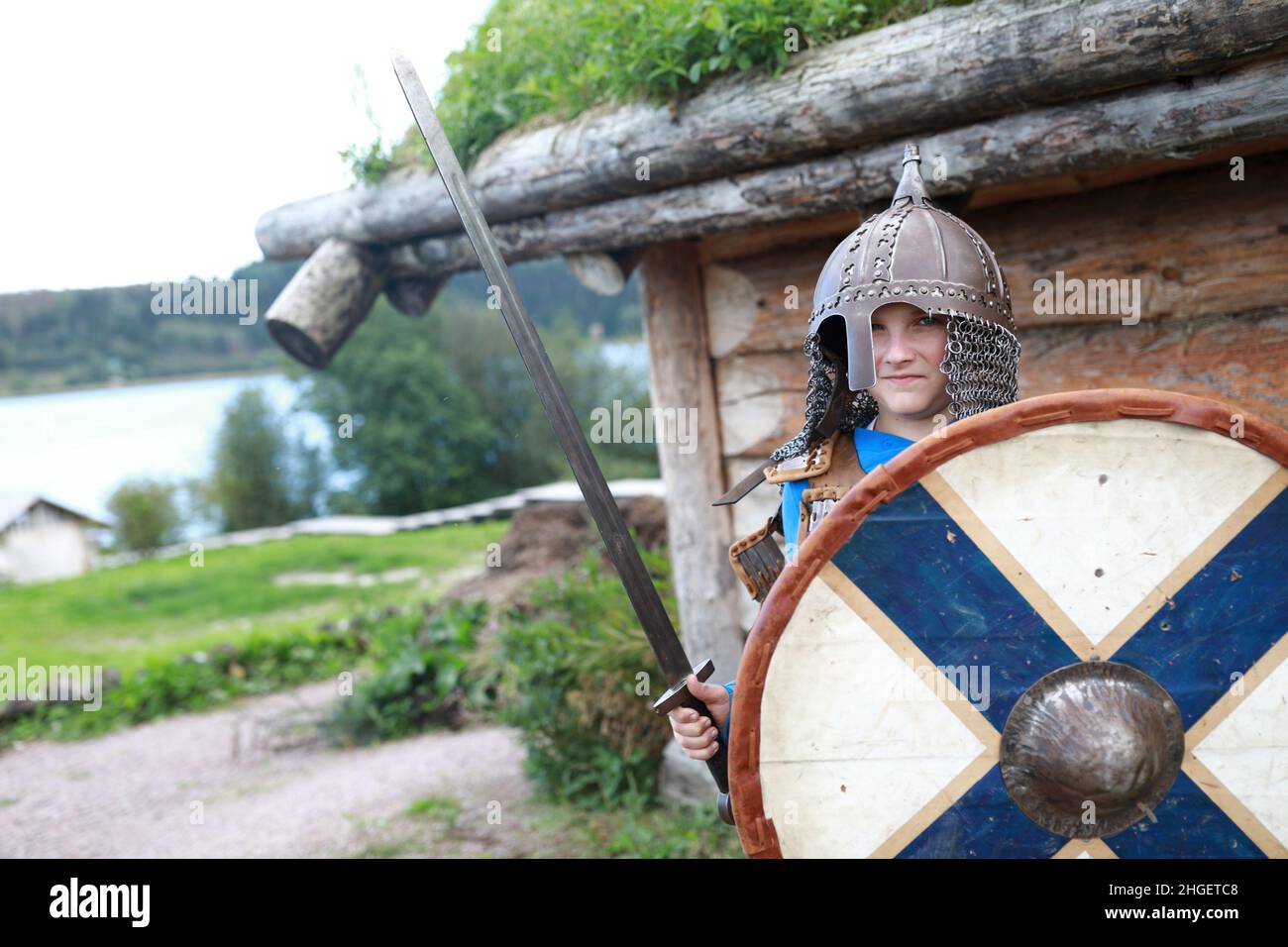 Portrait of kid in Viking Armor with shield, Karelia Stock Photo - Alamy