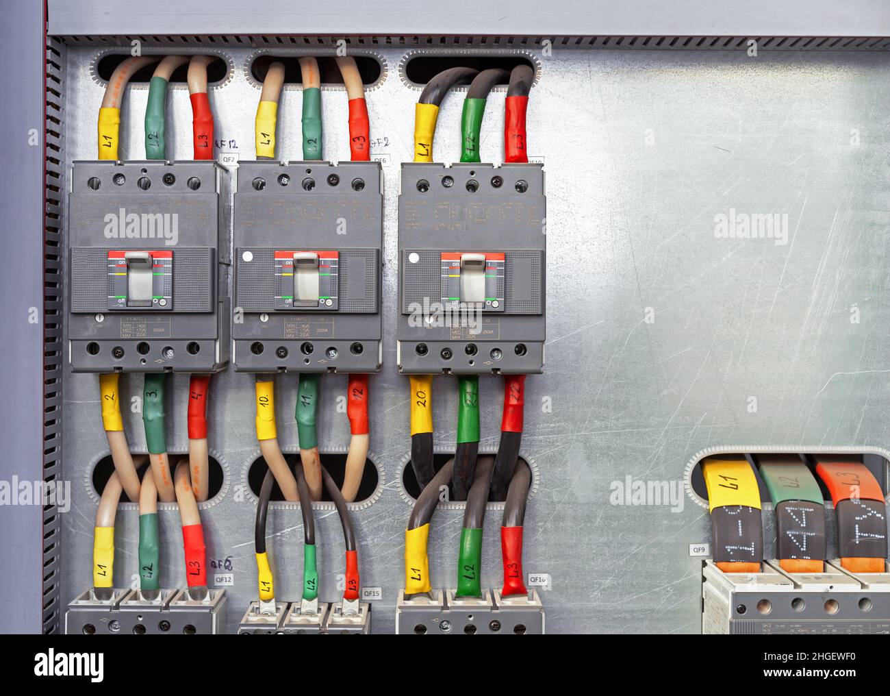 Electrical switchboard with different colored wires and sensors ...
