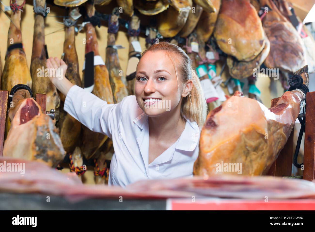 Woman selling pig meat pork hi-res stock photography and images - Alamy