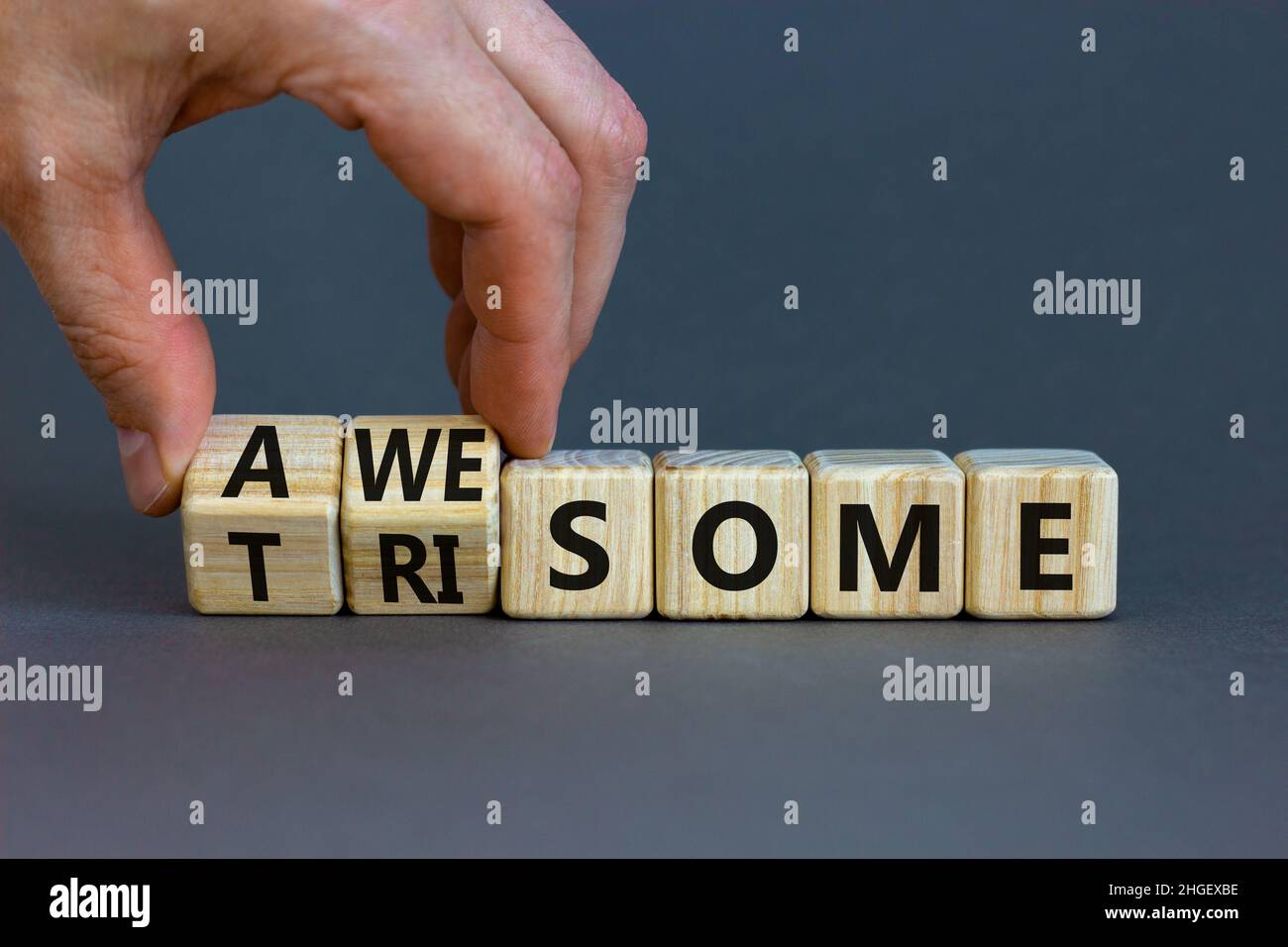 Awesome or trisome symbol. Doctor turns wooden cubes and changes the ...