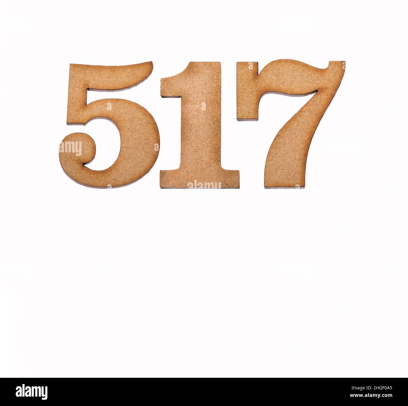 Number 517 in wood, isolated on white background Stock Photo - Alamy