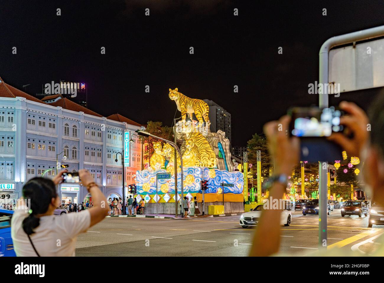 People seen taking photos of monument of a tiger in Chinatown Stock ...