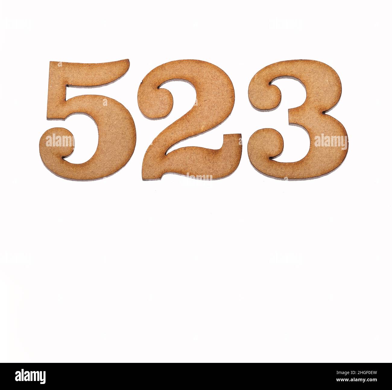 Number 523 in wood, isolated on white background Stock Photo - Alamy