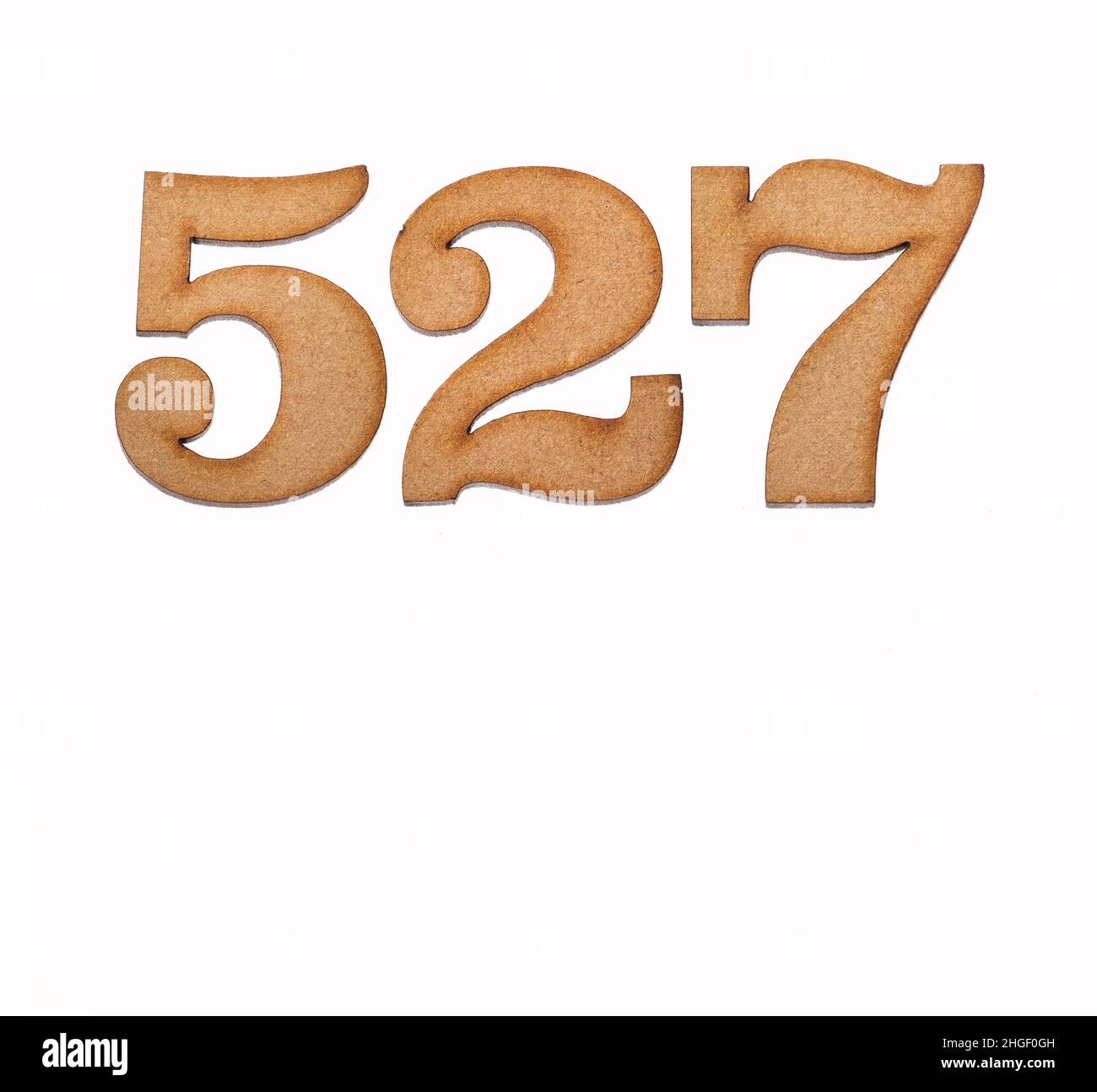 Number 527 in wood, isolated on white background Stock Photo - Alamy