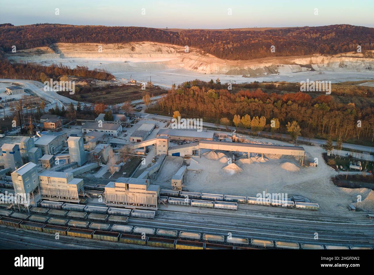 Aerial view of cargo train loaded with crushed stone materials at ...