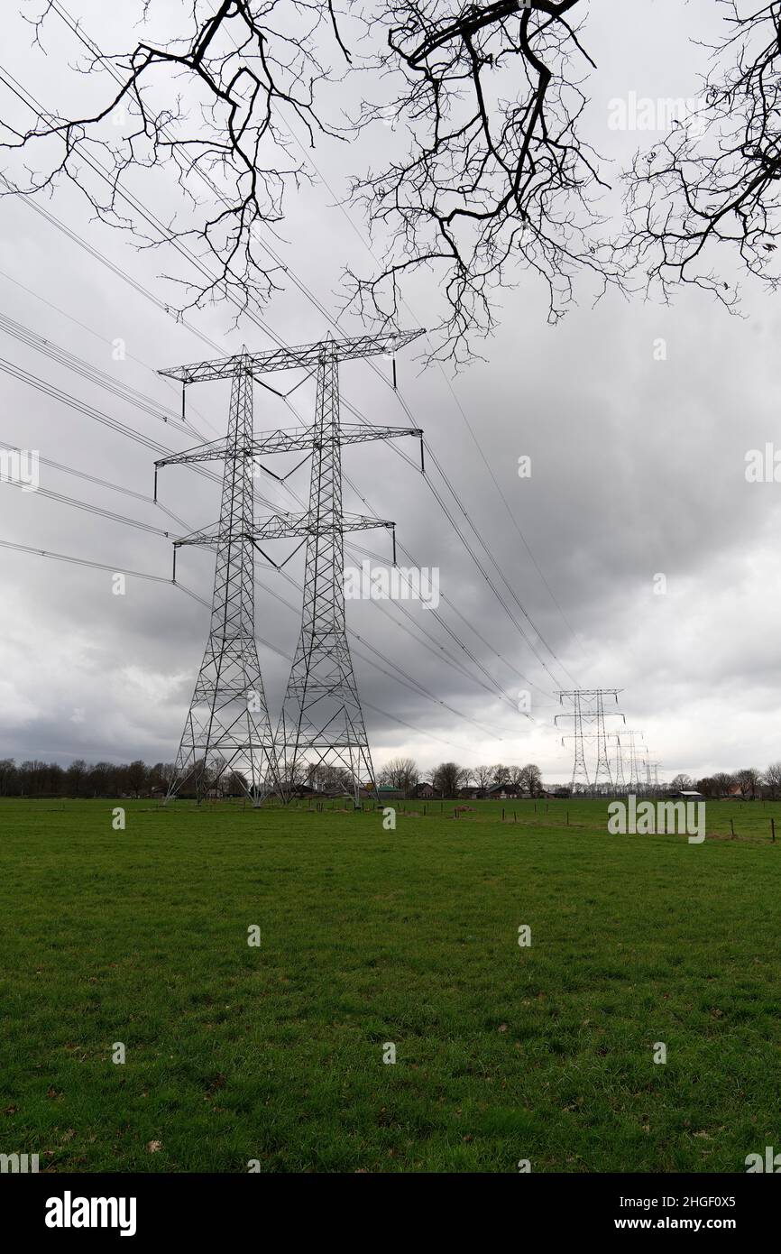 High-Voltage Mast or pylon with powerlines to transport electricity ...