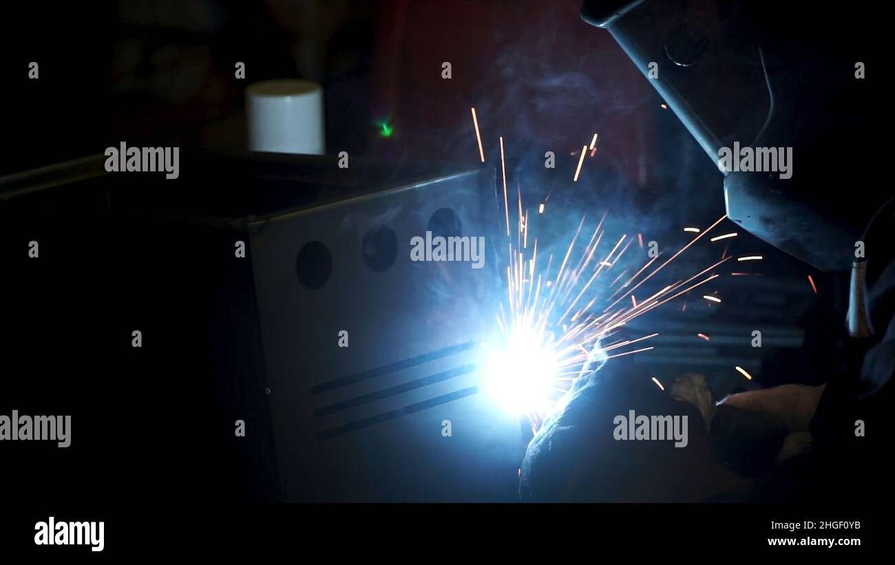 Worker man welding electrode fusing hi-res stock photography and images ...