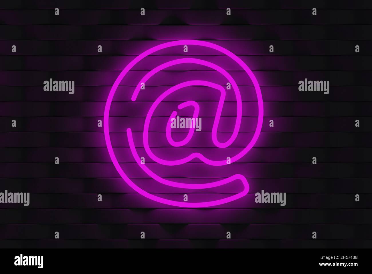 Glowing email sign of violet color on dark wall. Neon effect. Access to ...