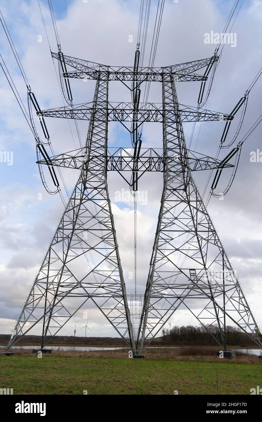 High-Voltage Mast or pylon with powerlines to transport electricity ...