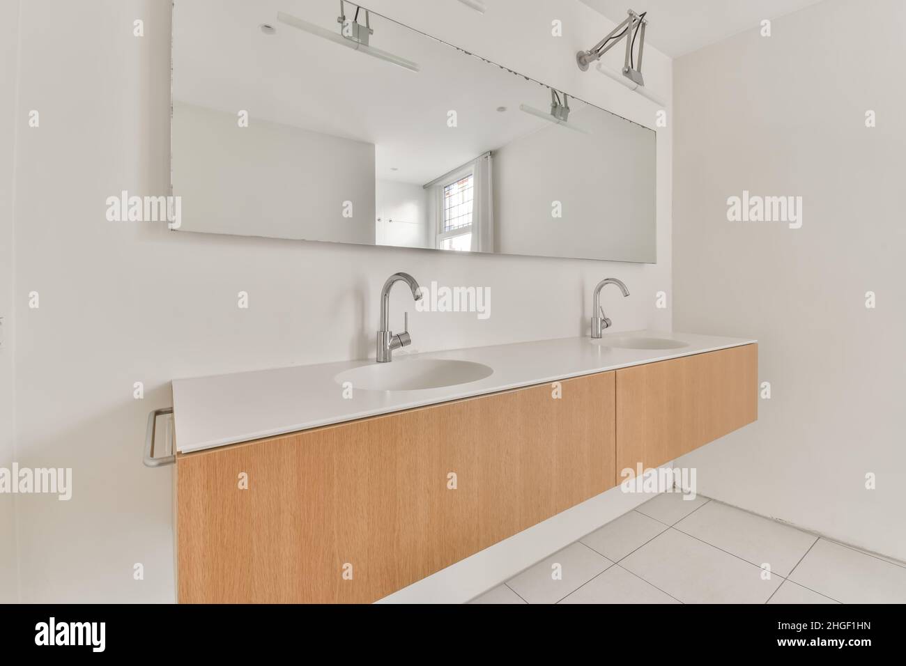 Bright and stylish bathroom in luxury modern house Stock Photo - Alamy