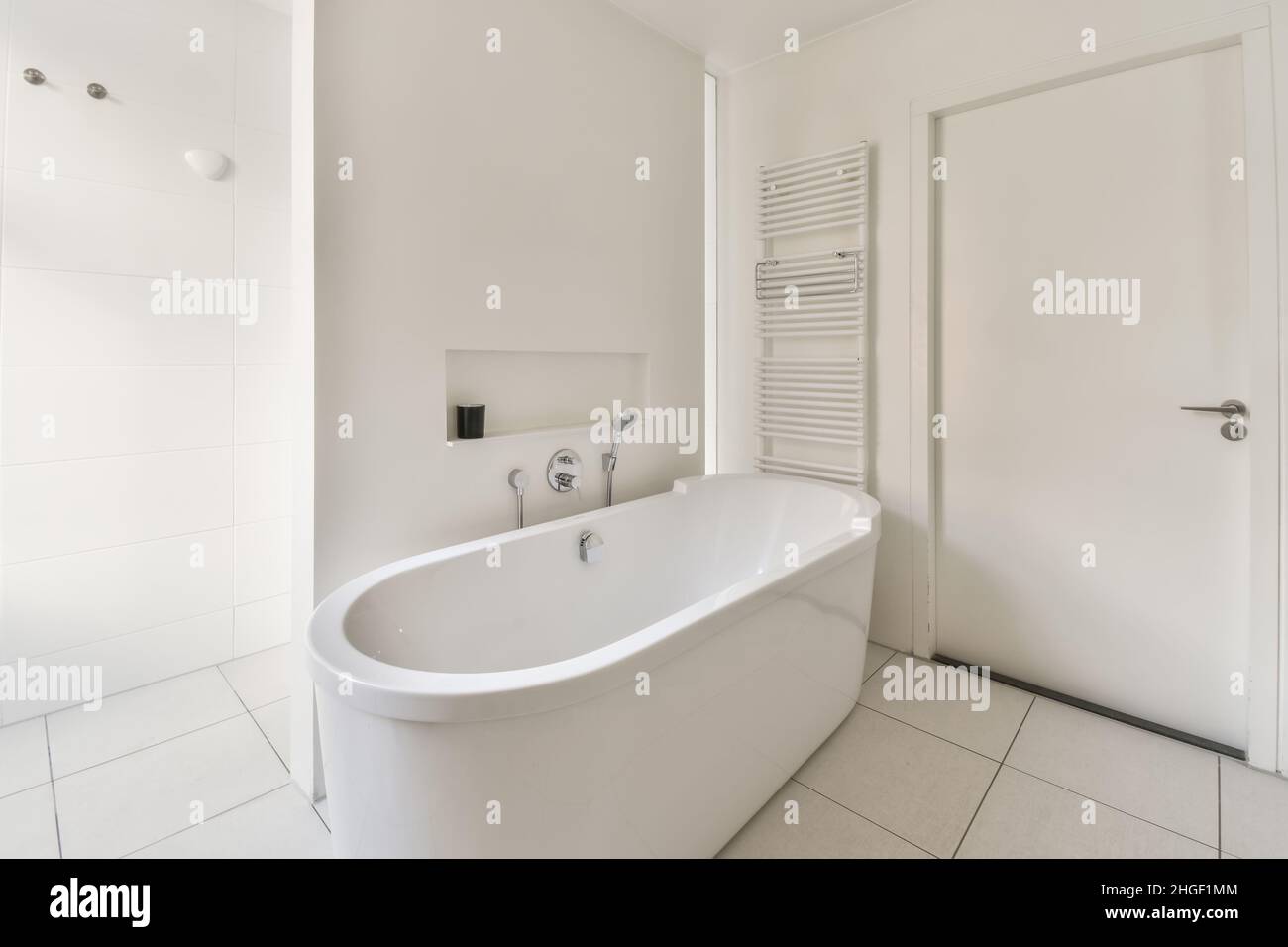Bright and stylish bathroom in luxury modern house Stock Photo - Alamy