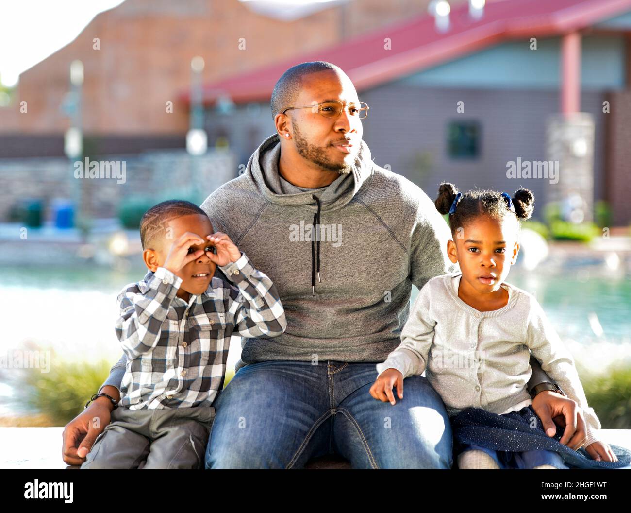 Lifestyle of father with son and daughter Stock Photo - Alamy