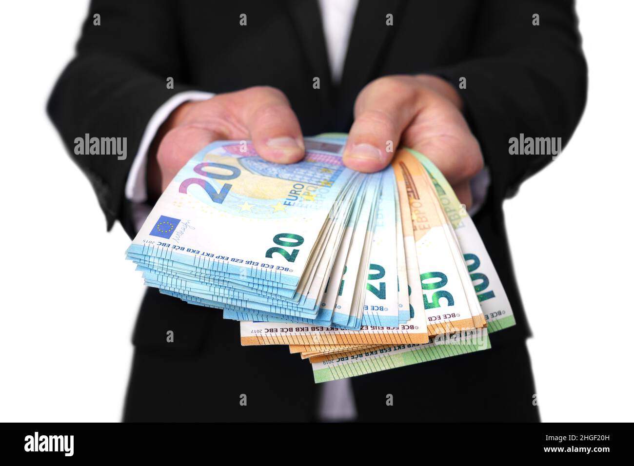 Man giving or offering money. Businessman holding euro banknotes or ...