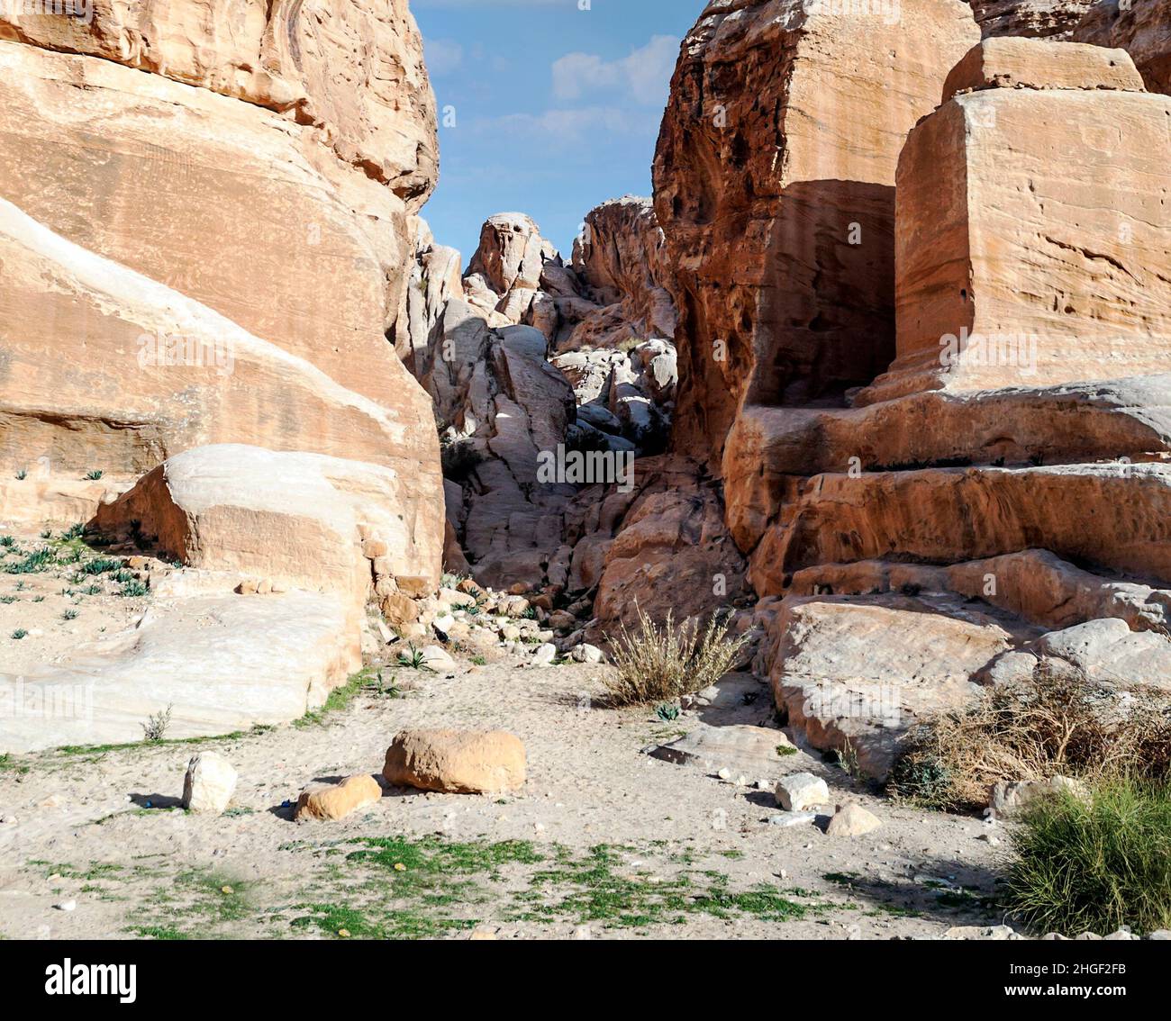 Ruins of the ancient city of Petra in Jordan in a sunny day. Petra is ...
