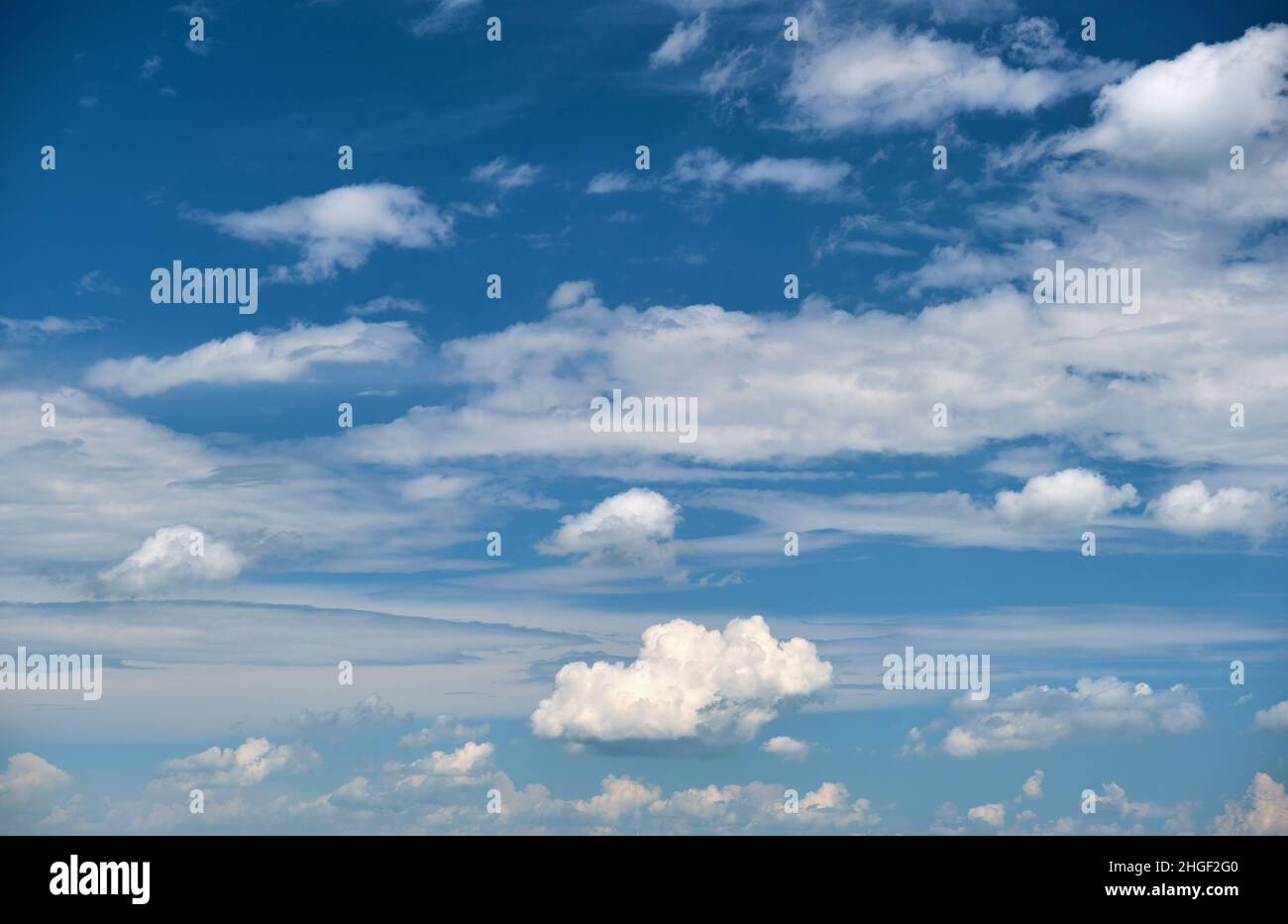 Bright landscape of white puffy cumulus clouds on blue clear sky Stock ...